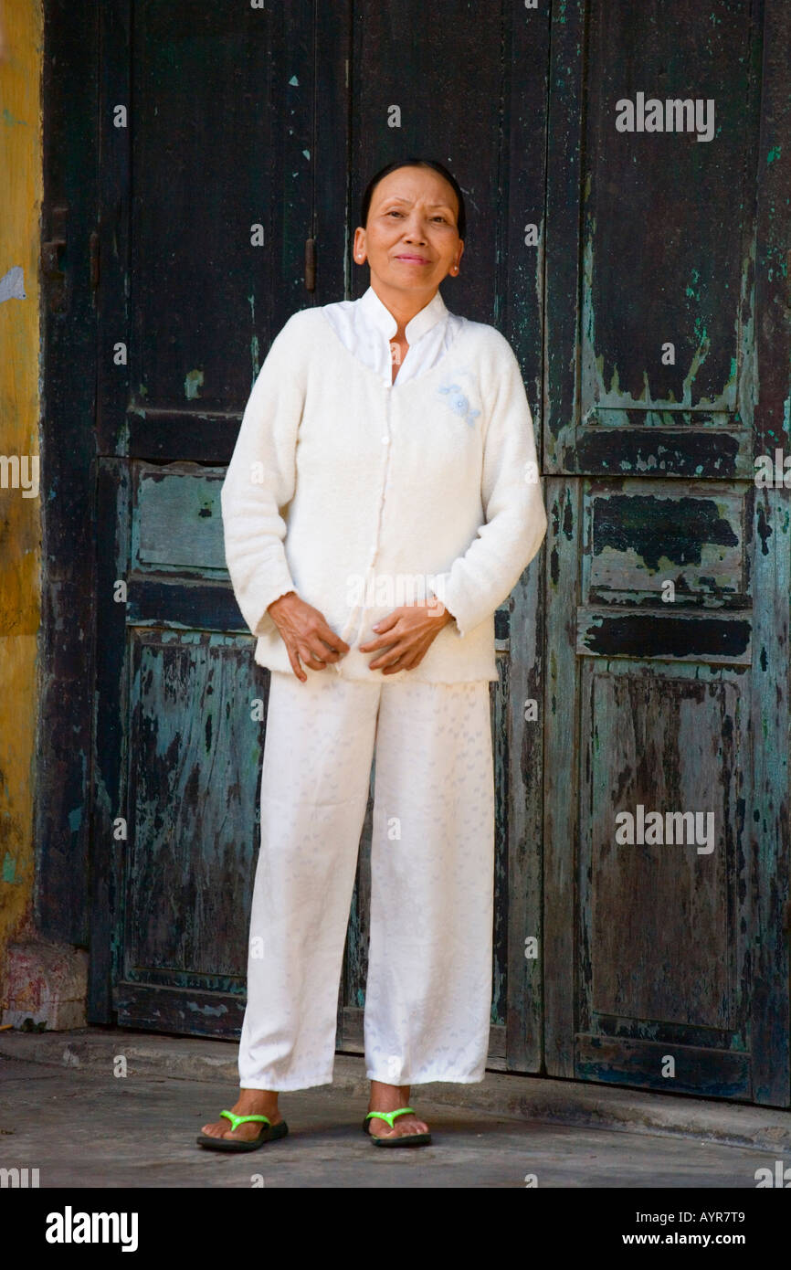 Proud, mature, Vietnamese woman in white pants-suit, Hoi An Vietnam ...