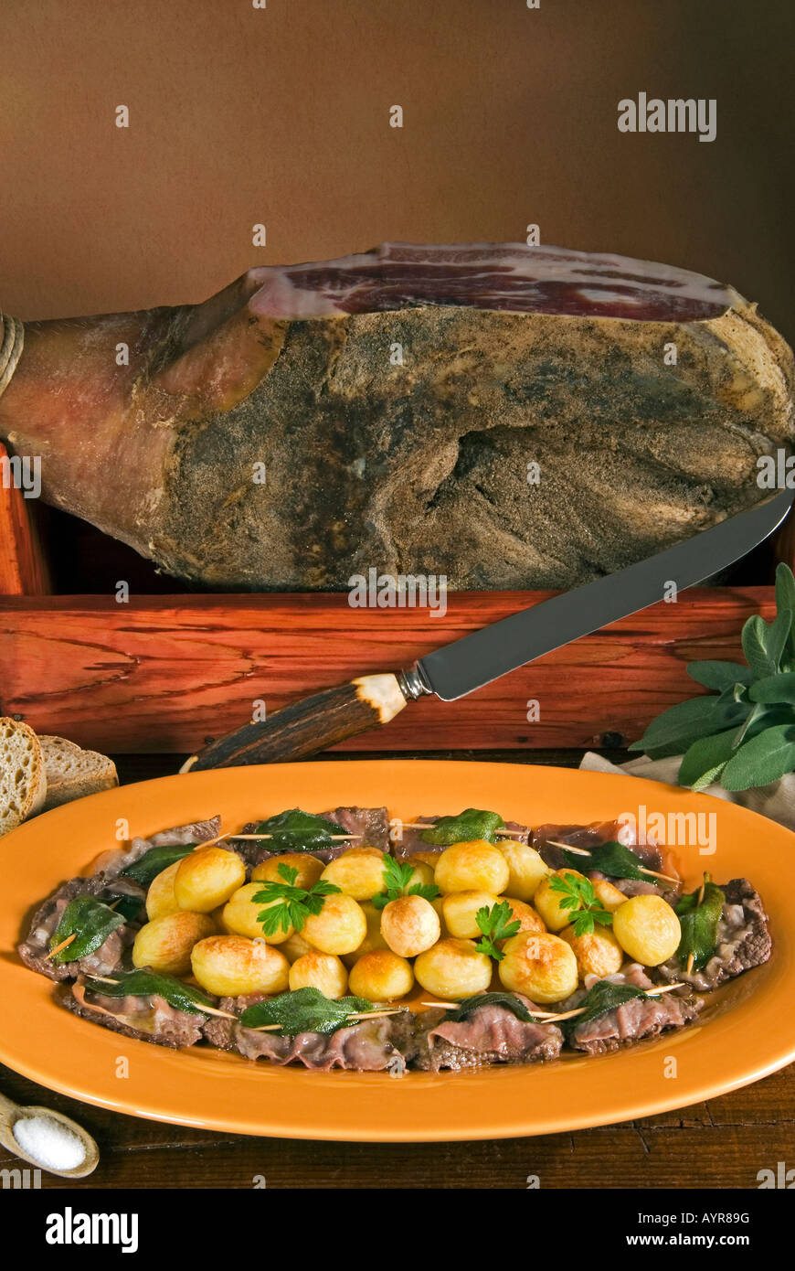 Roman food, Saltimbocca alla romana, Meat with ham and sage Stock Photo ...