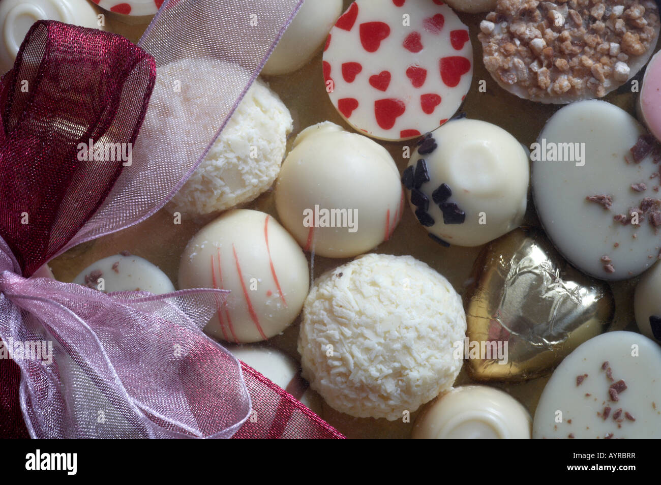 Assortment of luxury white chocolates Stock Photo - Alamy