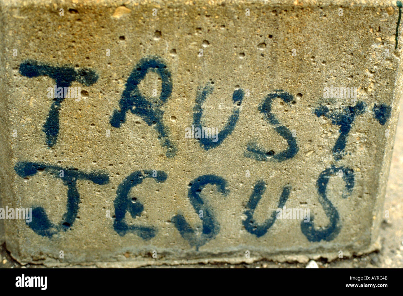 Wall with Trust Jesus graffiti spray painted on it. Minneapolis ...