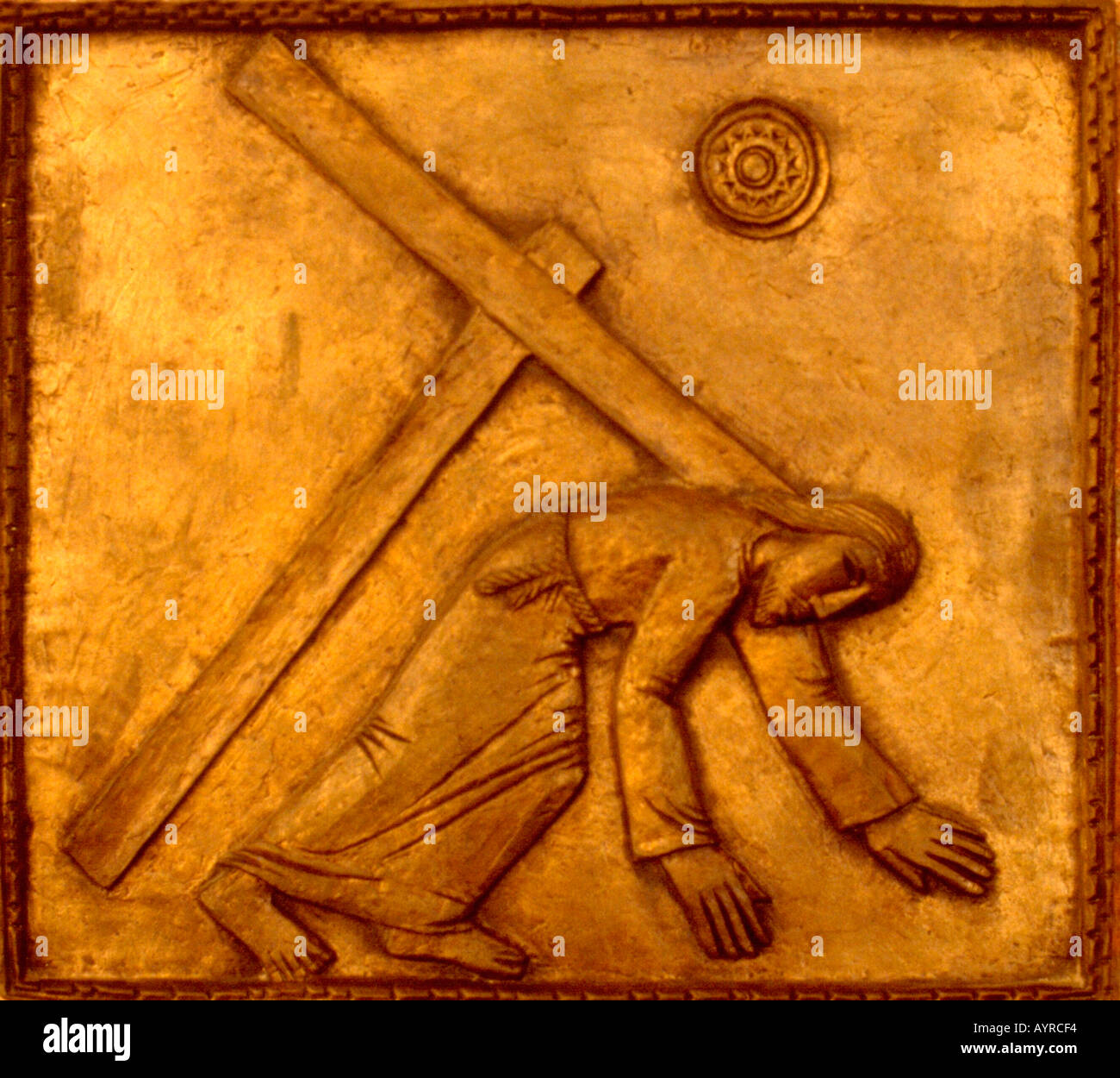 Stations of the Cross number seven Jesus falling with cross on back ...