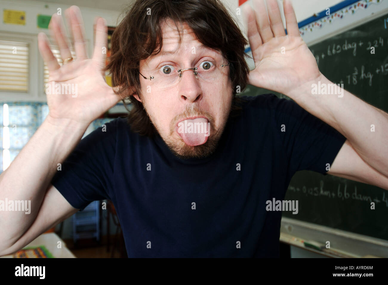 Man making silly faces Stock Photo - Alamy