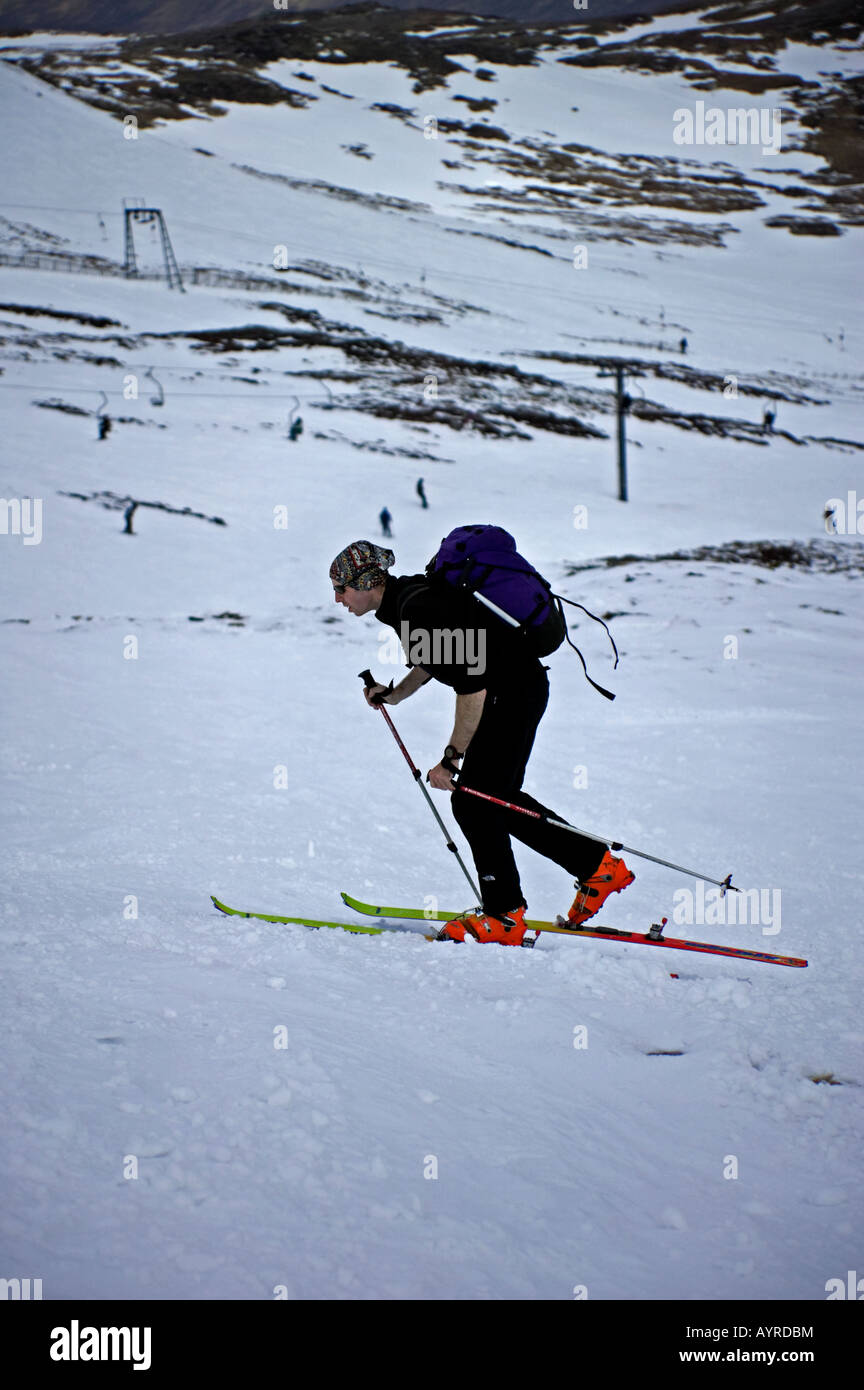 Lone male skinning up Glencoe Ski slopes Lochaber, Scotland, UK, Europe ...