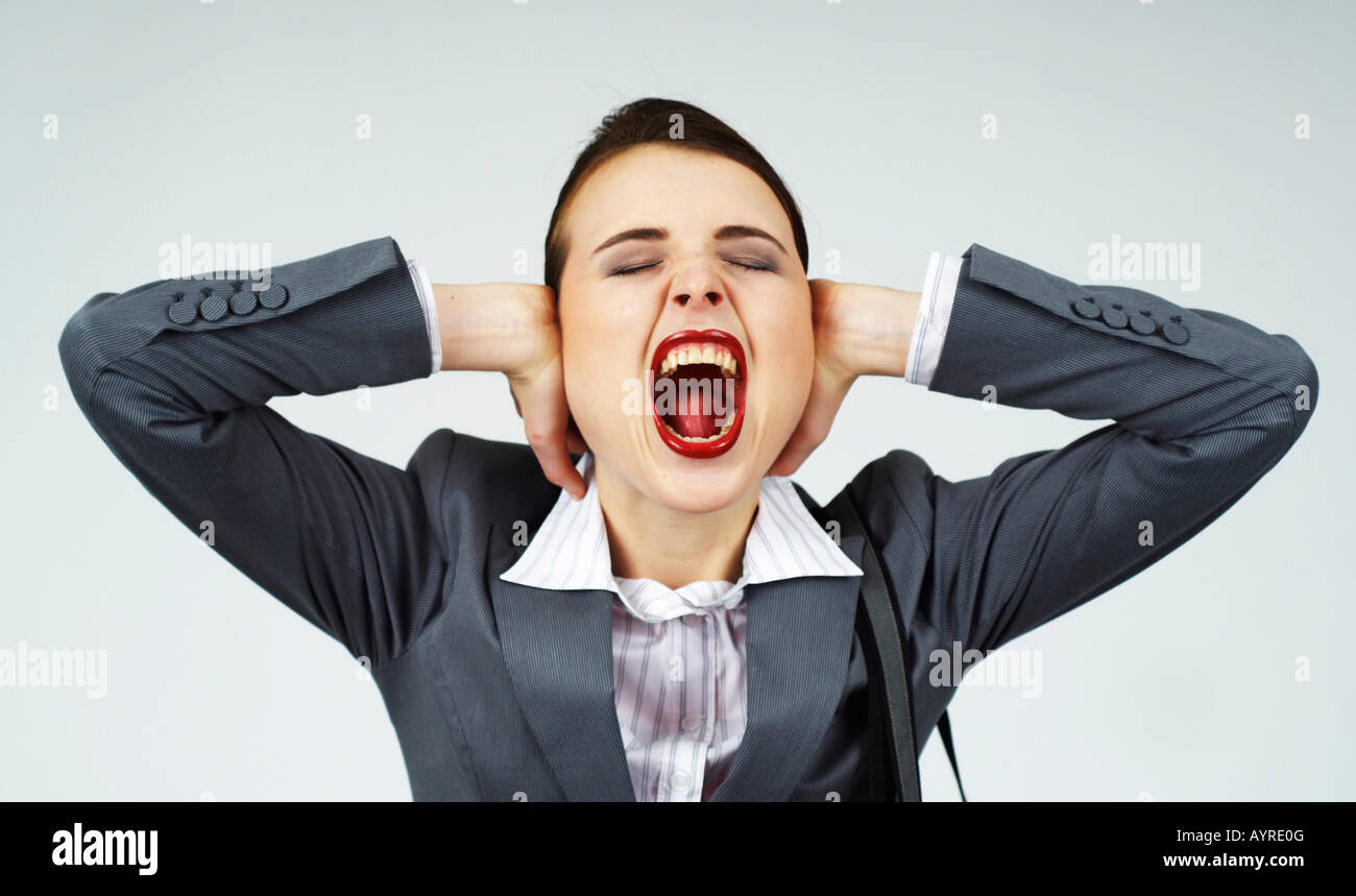Young businesswoman, female manager screaming out of frustration Stock ...