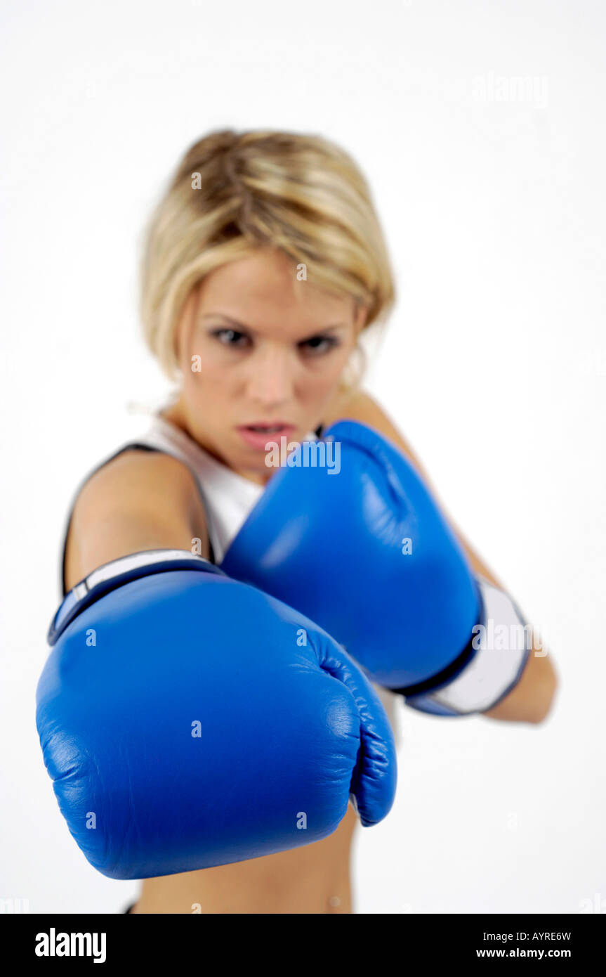Young female boxer, forward punch Stock Photo - Alamy