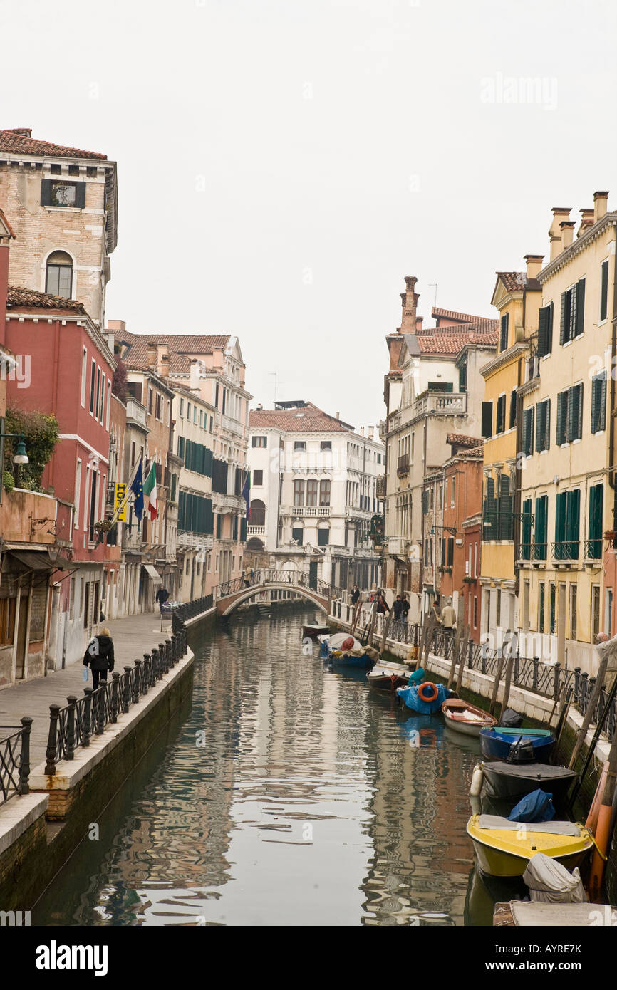 along small canal in the beautiful city of venice in italy Stock Photo ...