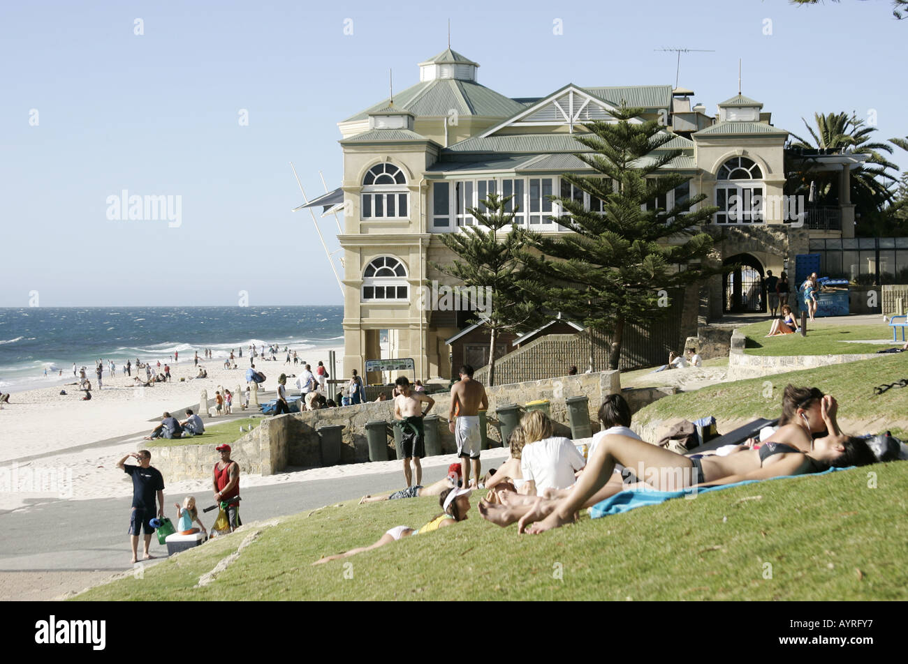 People sunbathing on Cottesloe beach near the Surf Club and Indian Tea ...