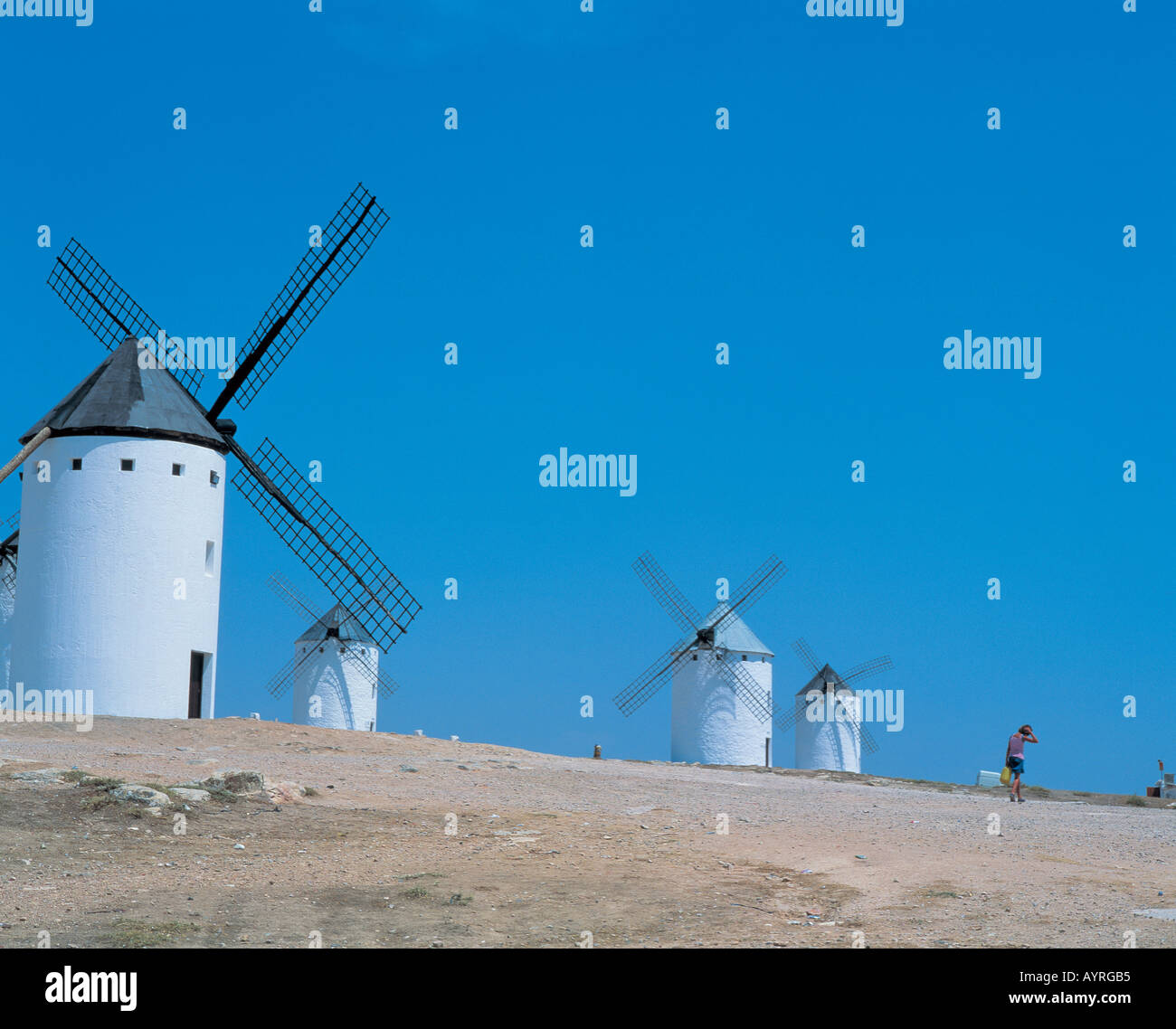 Windmills with Person Stock Photo - Alamy