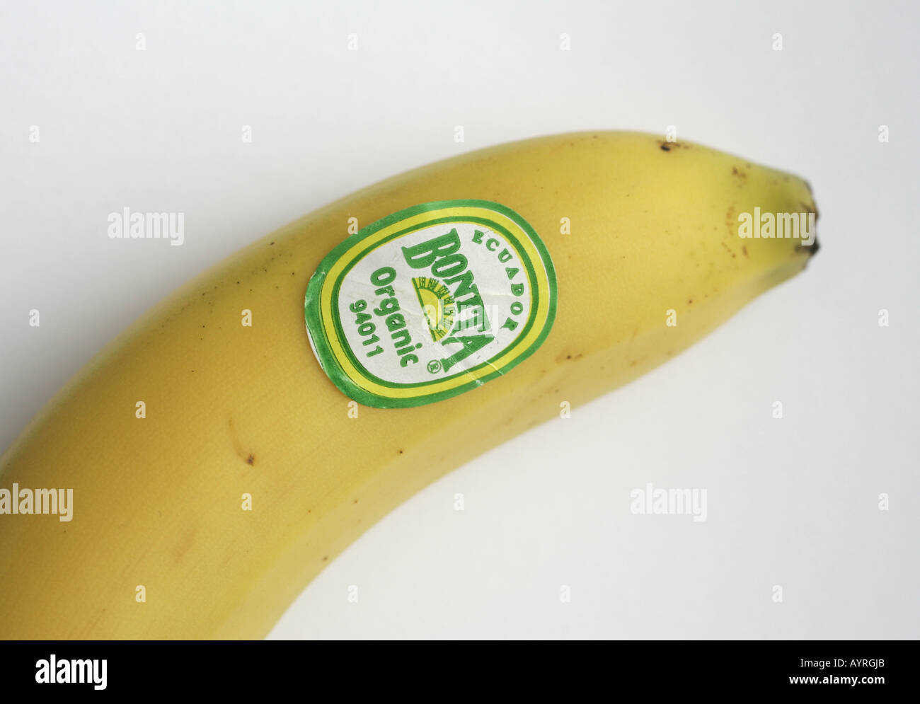 one organic banana with label Stock Photo - Alamy