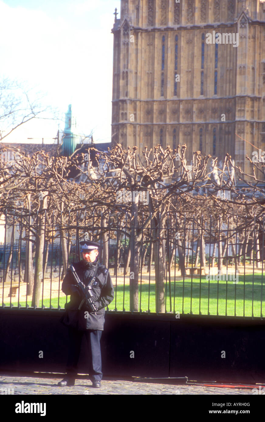 A security guard stands outside of the official entrance to Parliament ...