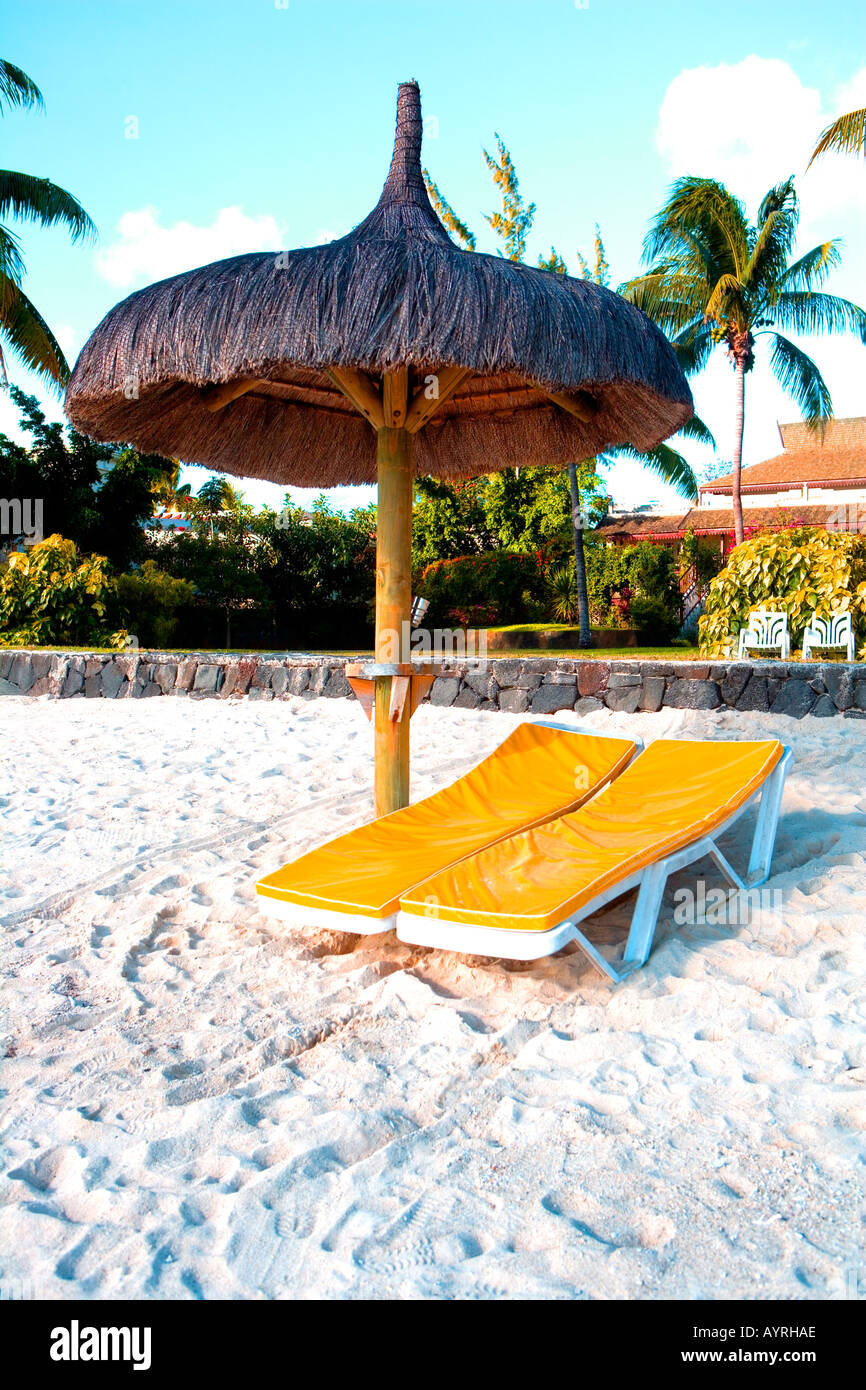 Mauritius Beach hut shade with yellow loungers Stock Photo - Alamy