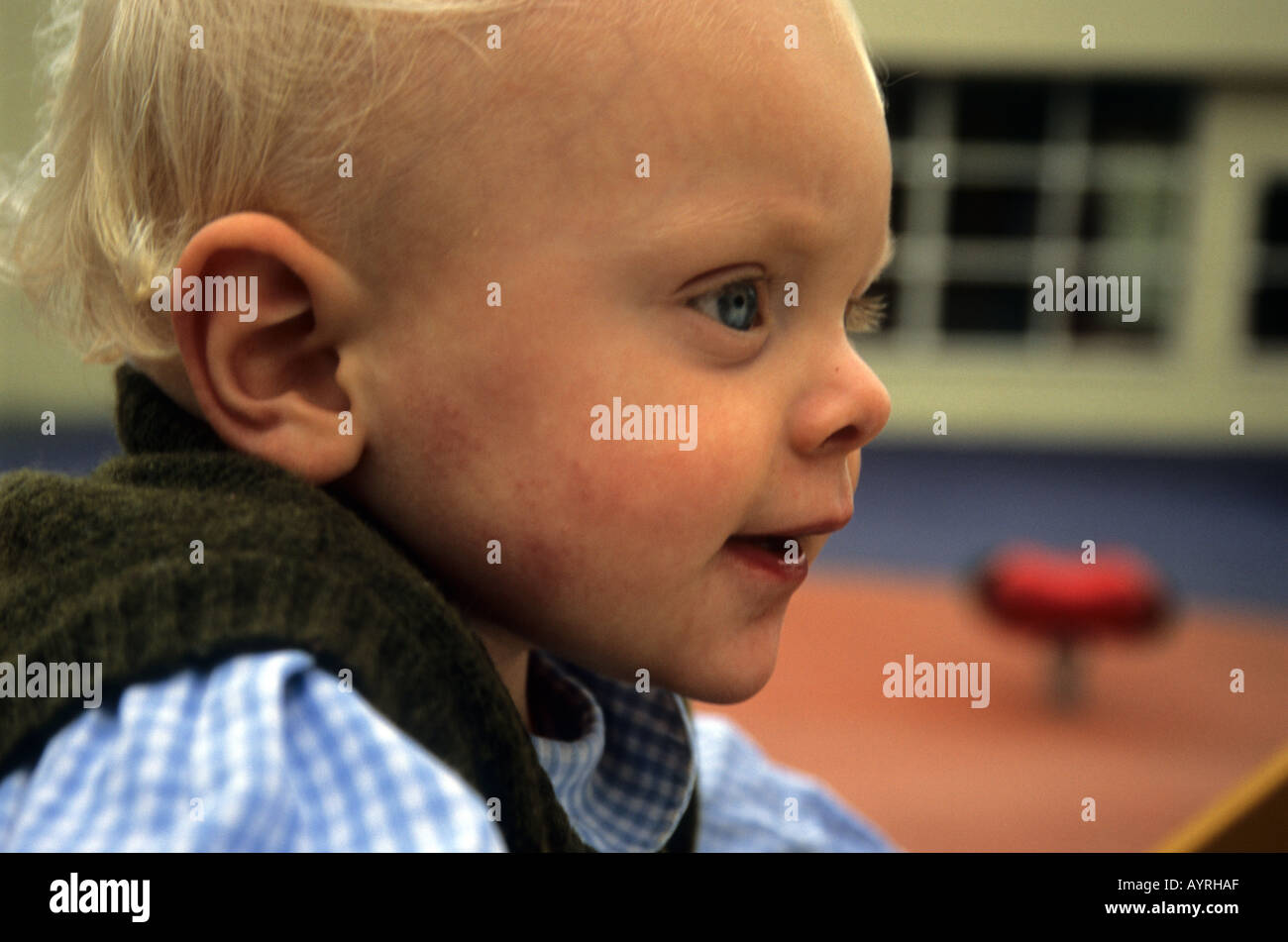 Toddler boy profile, reflective Stock Photo - Alamy