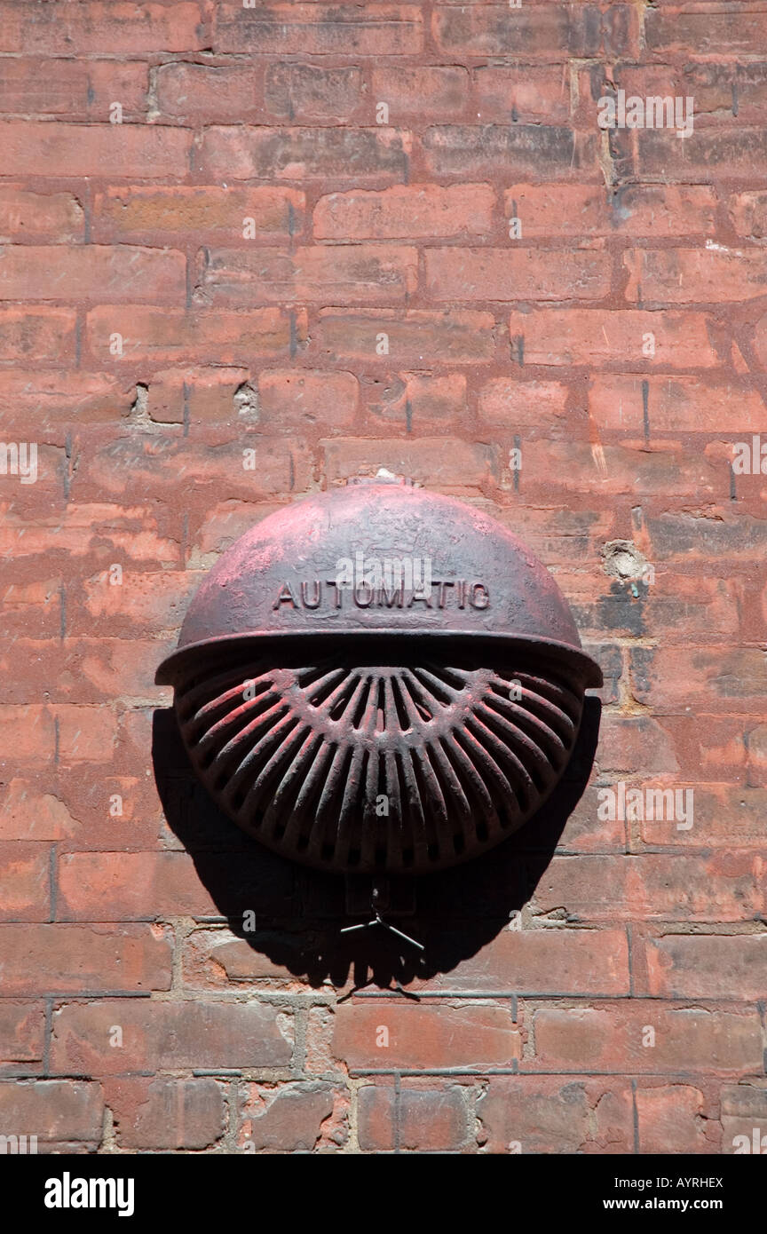 Fire alarm mounted on exterior brick wall Stock Photo - Alamy