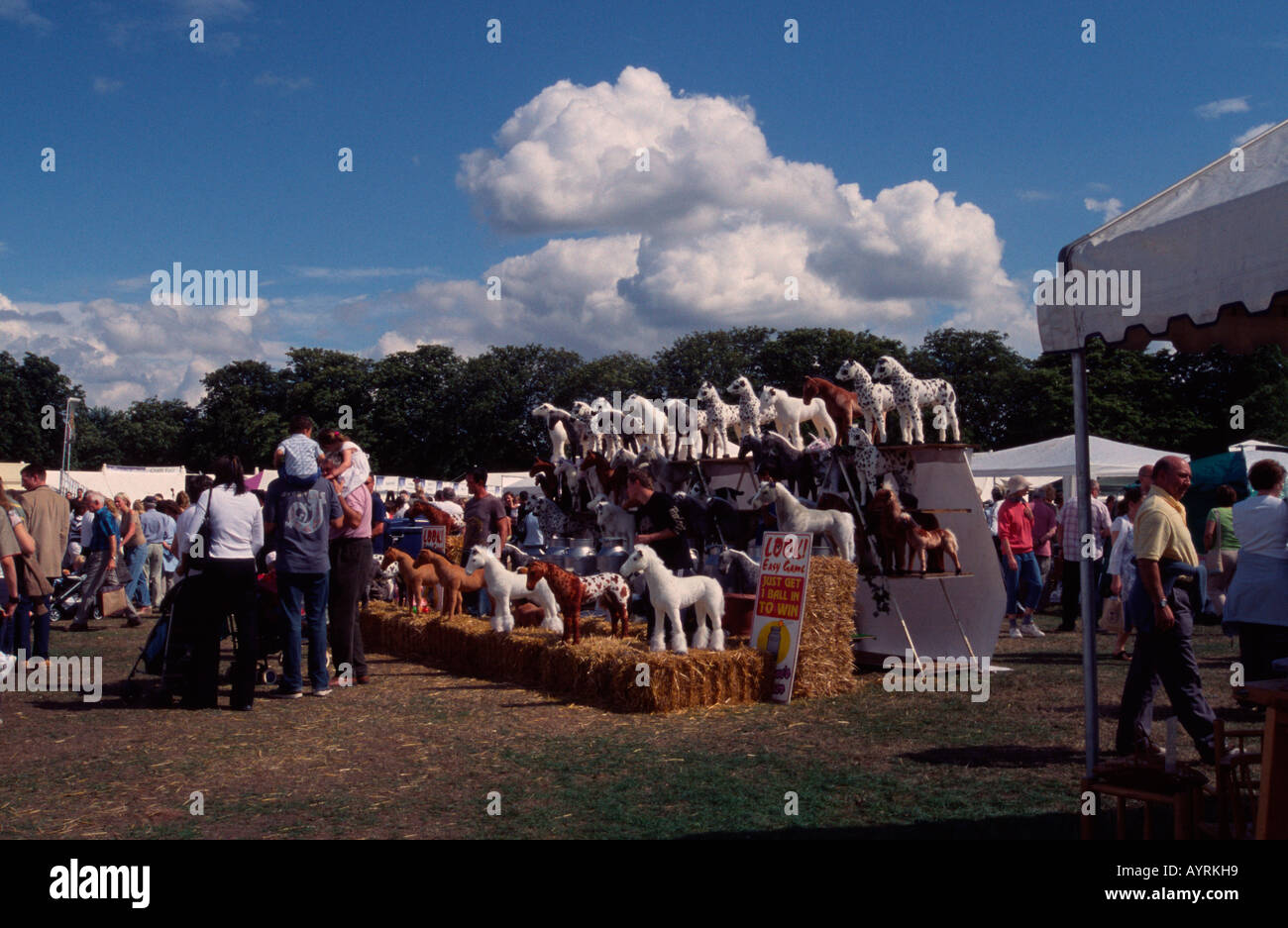 Sideshows at the funfair, the Hampton Court Craft Fair, West London, UK ...