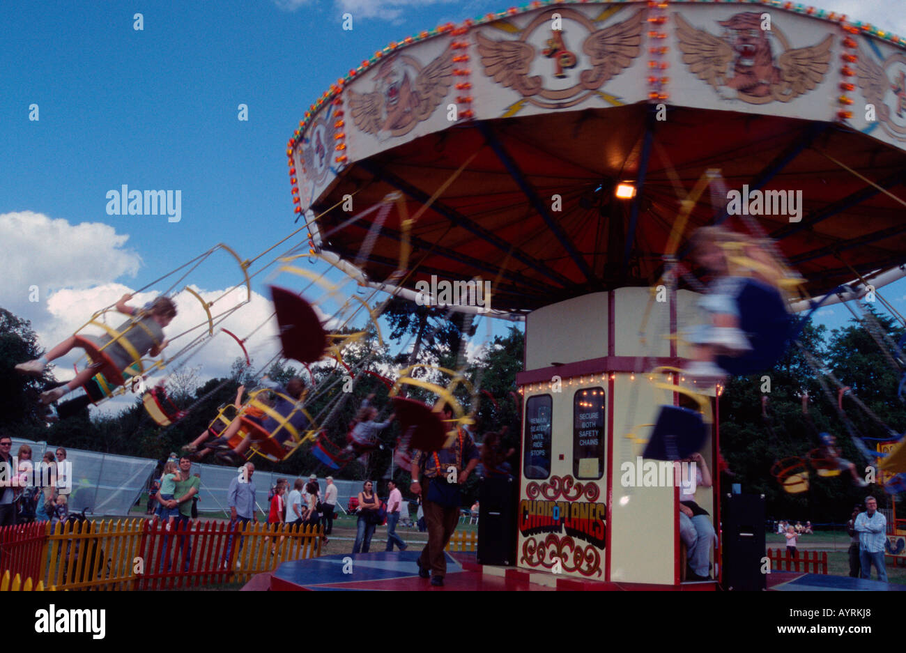Chairaplanes roundabout, the funfair at the Hampton Court Craft Fair ...