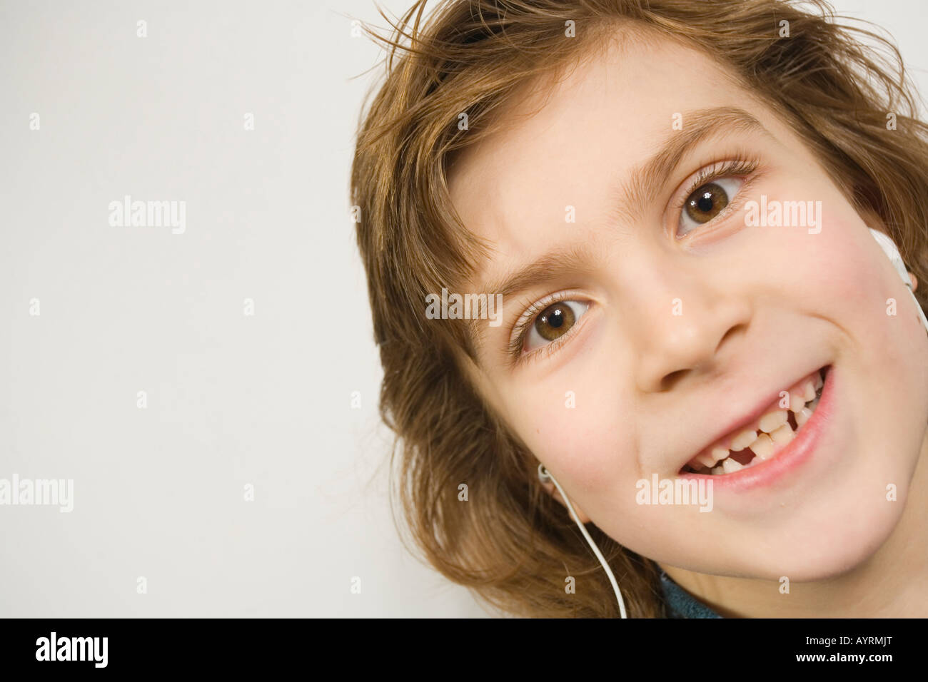 A child listening to music Stock Photo - Alamy