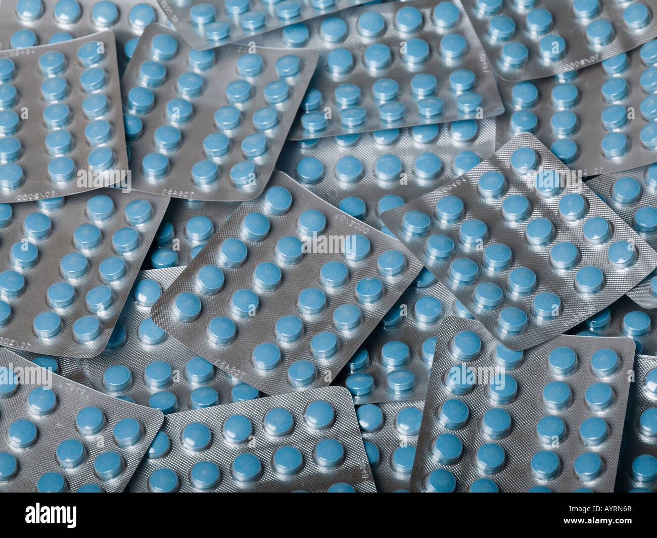 Pile of pills in blister packs full frame Stock Photo - Alamy