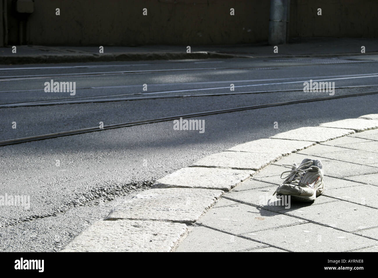 Lost shoe on an early saturday morning Stock Photo - Alamy