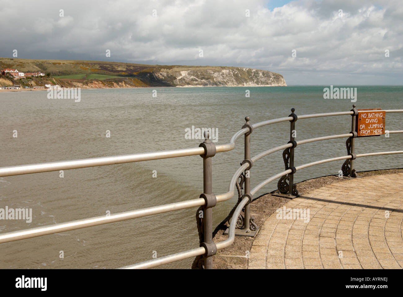 The pier at Swanage, Dorset looking north towards Ballard Cliff and ...