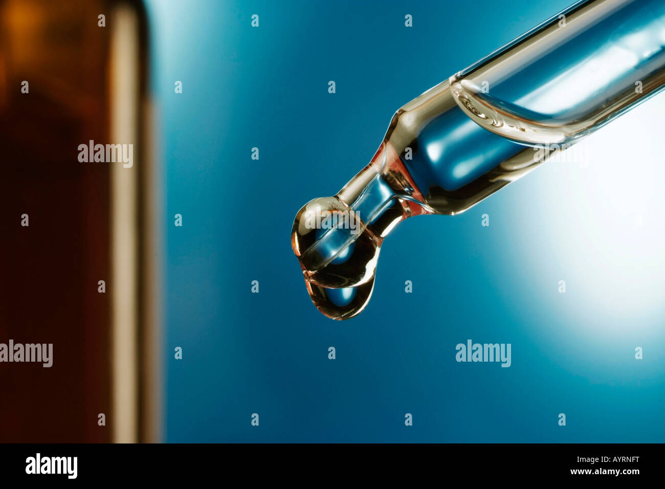 Drop falling from a pipette (chemical dropper Stock Photo - Alamy