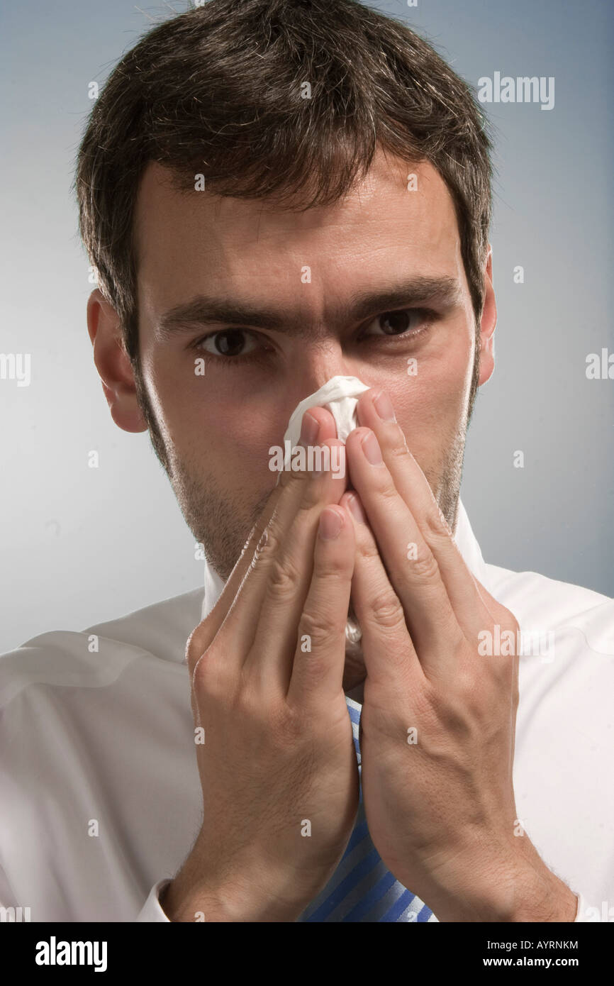 Blowing ones nose hi-res stock photography and images - Alamy