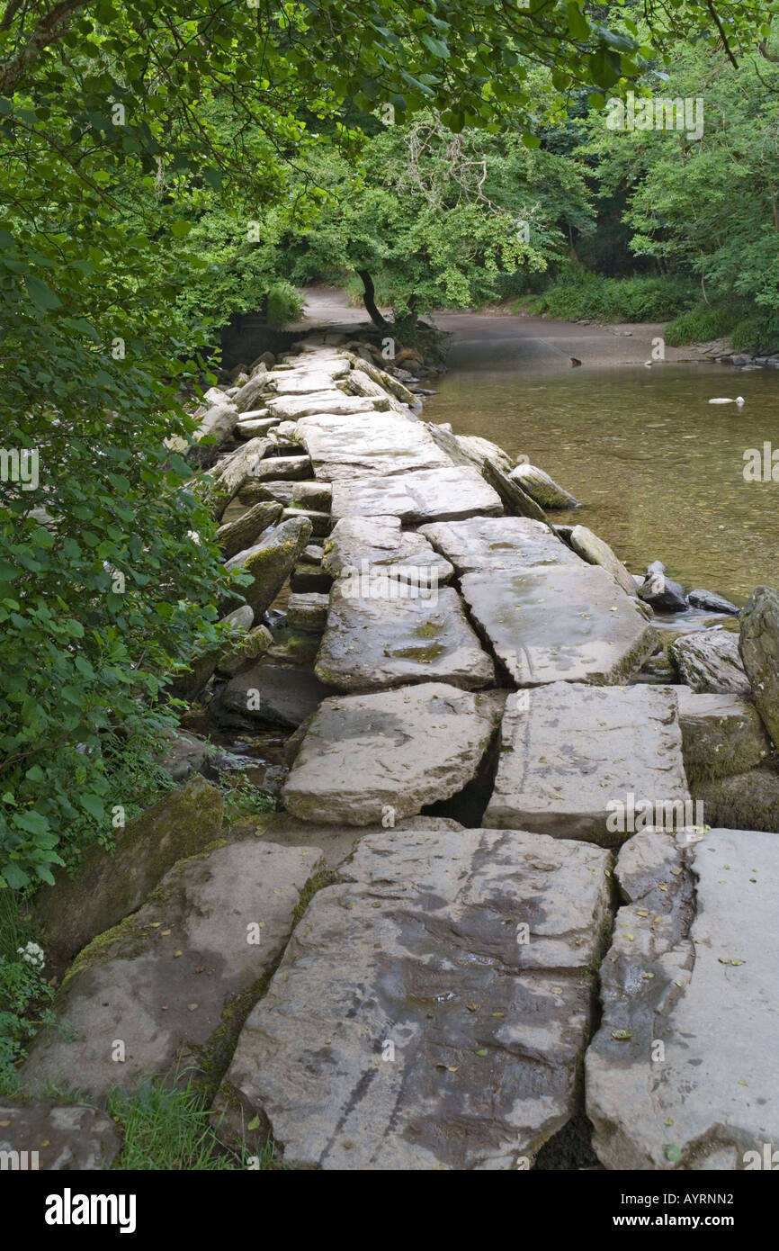 The prehistoric clapper bridge across the River Barle at Tarr Steps ...