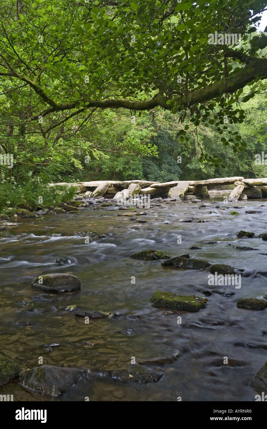 The prehistoric clapper bridge across the River Barle at Tarr Steps ...
