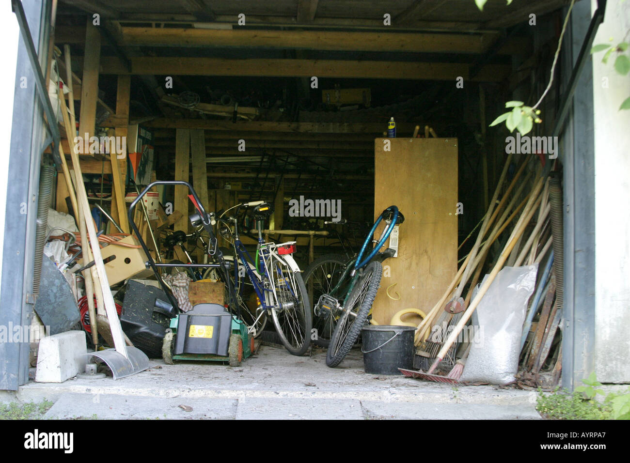 Messy garage full of things Stock Photo - Alamy