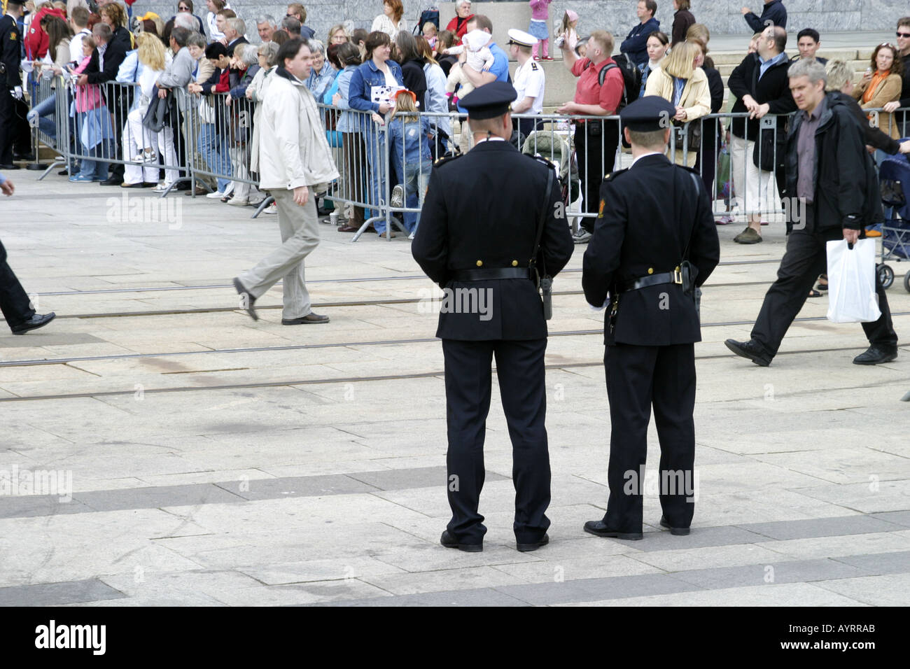 Two policement standing guard oslo norway Stock Photo - Alamy