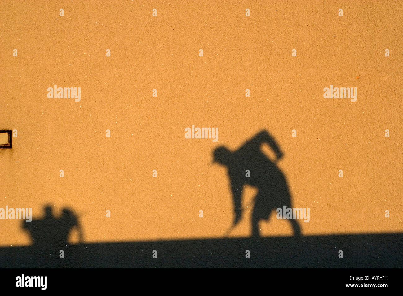 Shadow of a construction worker Stock Photo - Alamy
