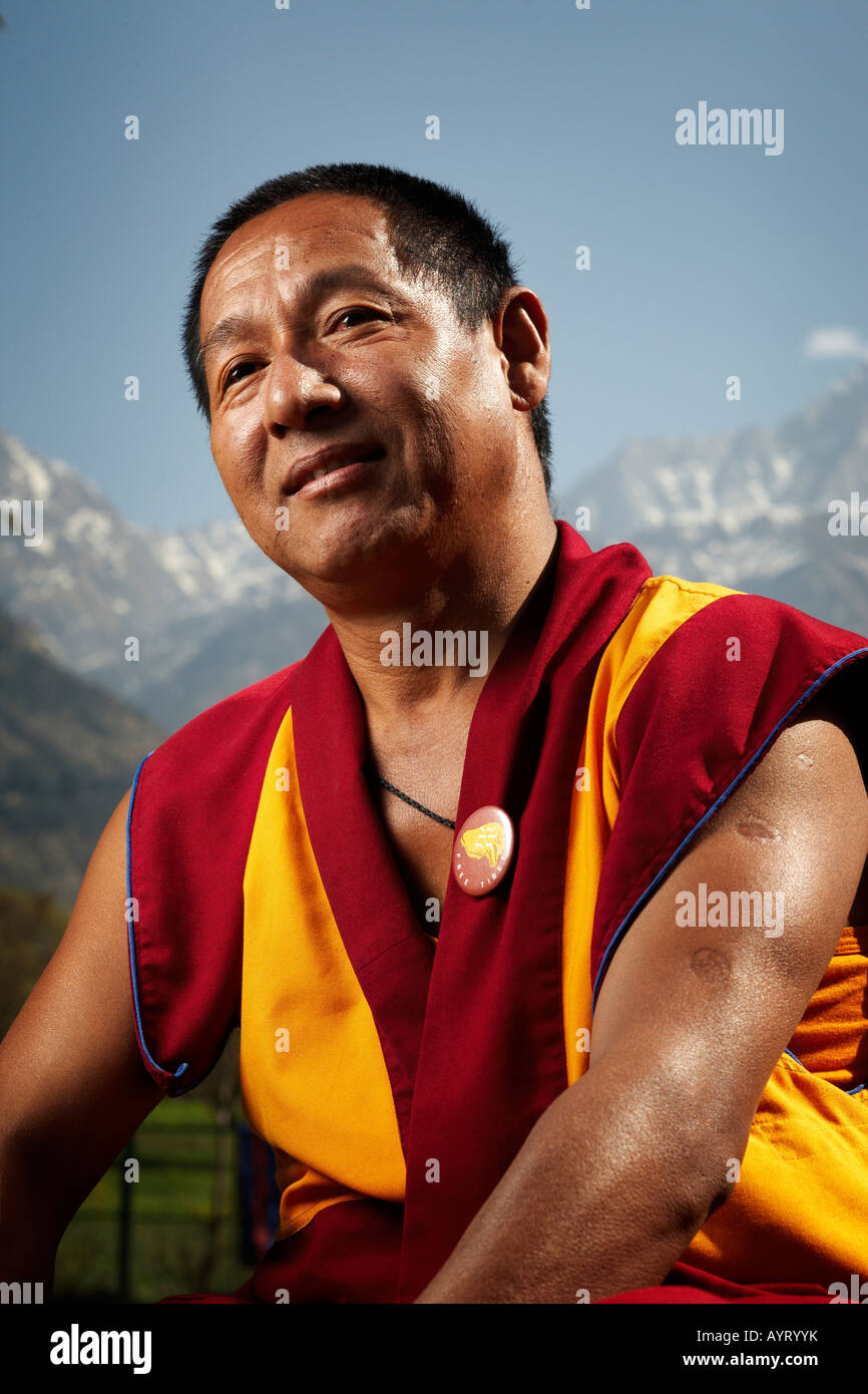 Portrait of a smiling Tibetan Buddhist monk in Dharamsala, India Stock ...