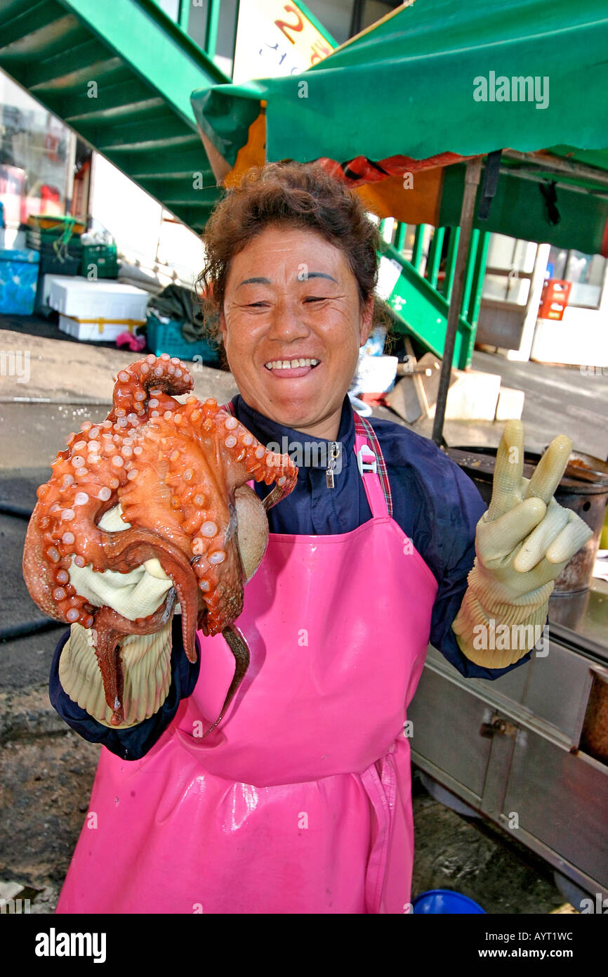 Octopus lady with octopus for sale Jagalchi fish market in Busan Korea ...