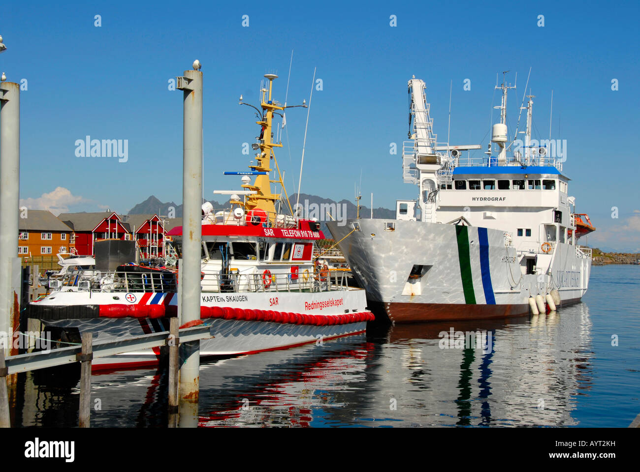 Two ships, SAR rescue boat, Kabelvag Harbour, Lofoten, Norway Stock ...