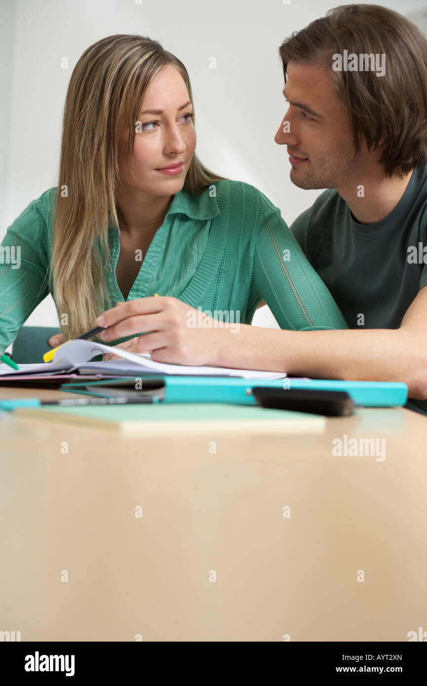 A couple learning Stock Photo - Alamy