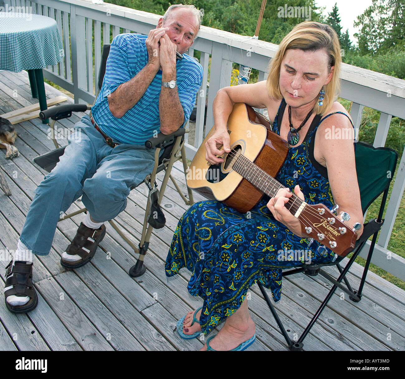 Friends play musical instruments Stock Photo - Alamy