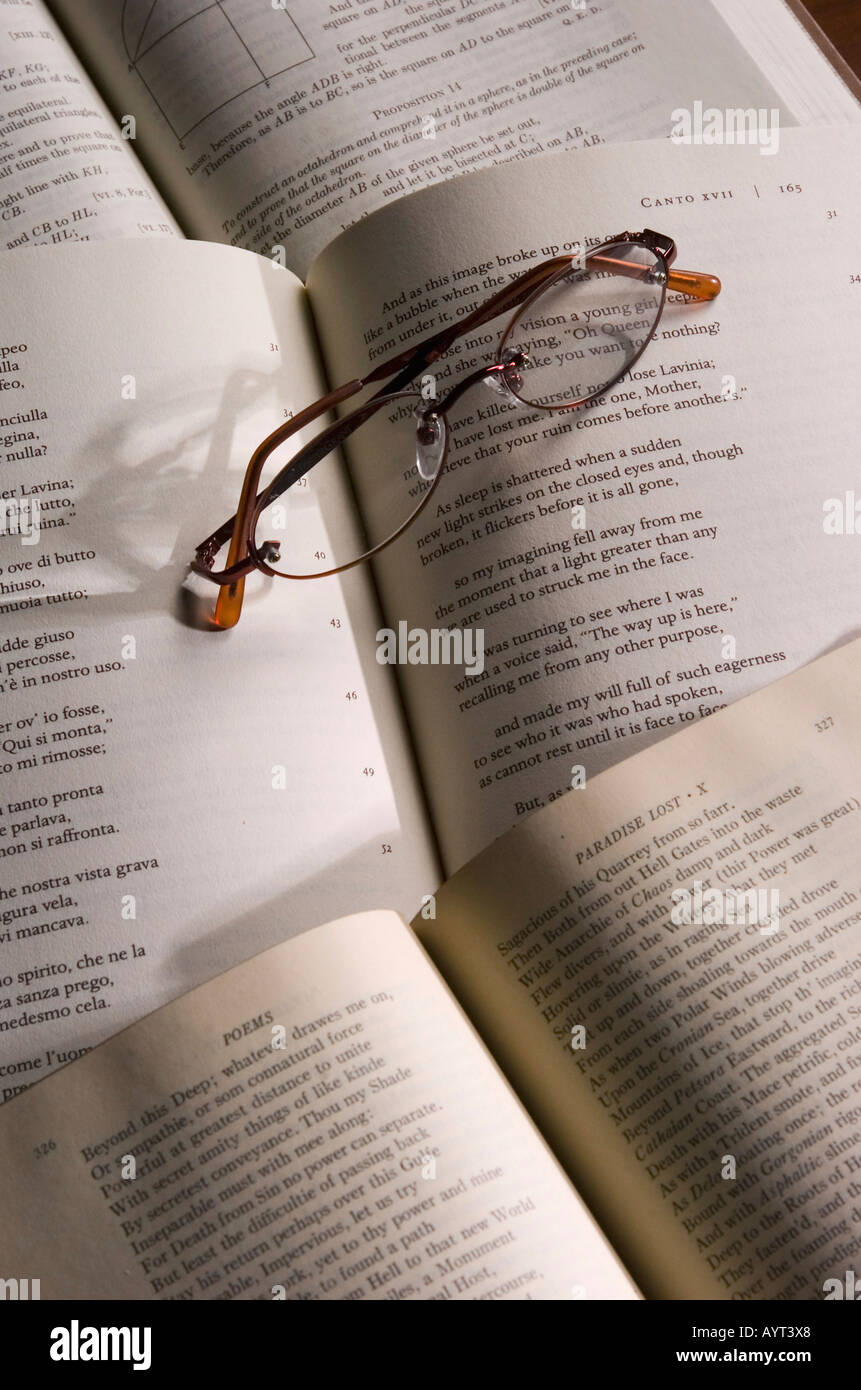 eyeglasses on an open book Stock Photo - Alamy