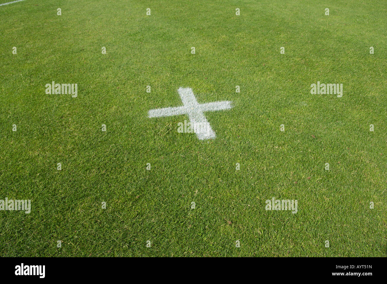 White cross on soccer field Stock Photo - Alamy