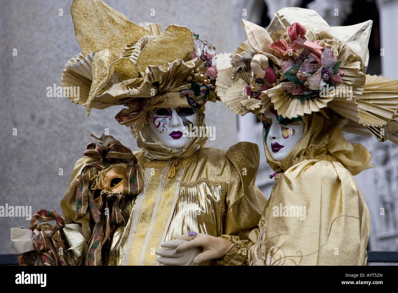 Two golden costumes and masks, Carnevale di Venezia, Carneval in Venice ...