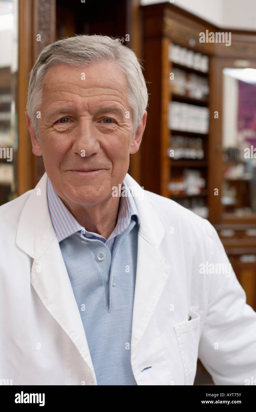 Pharmacist smiling at camera, portrait Stock Photo - Alamy
