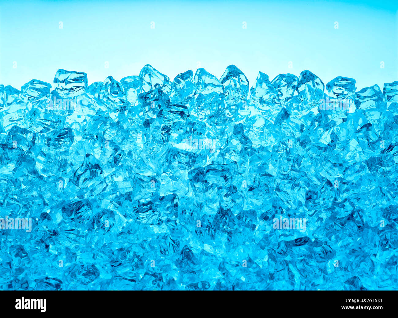Close up on mound of melted blue ice Stock Photo - Alamy