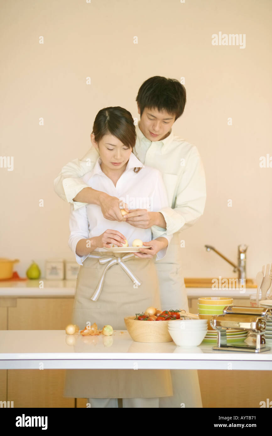 Couple in the kitchen Stock Photo - Alamy