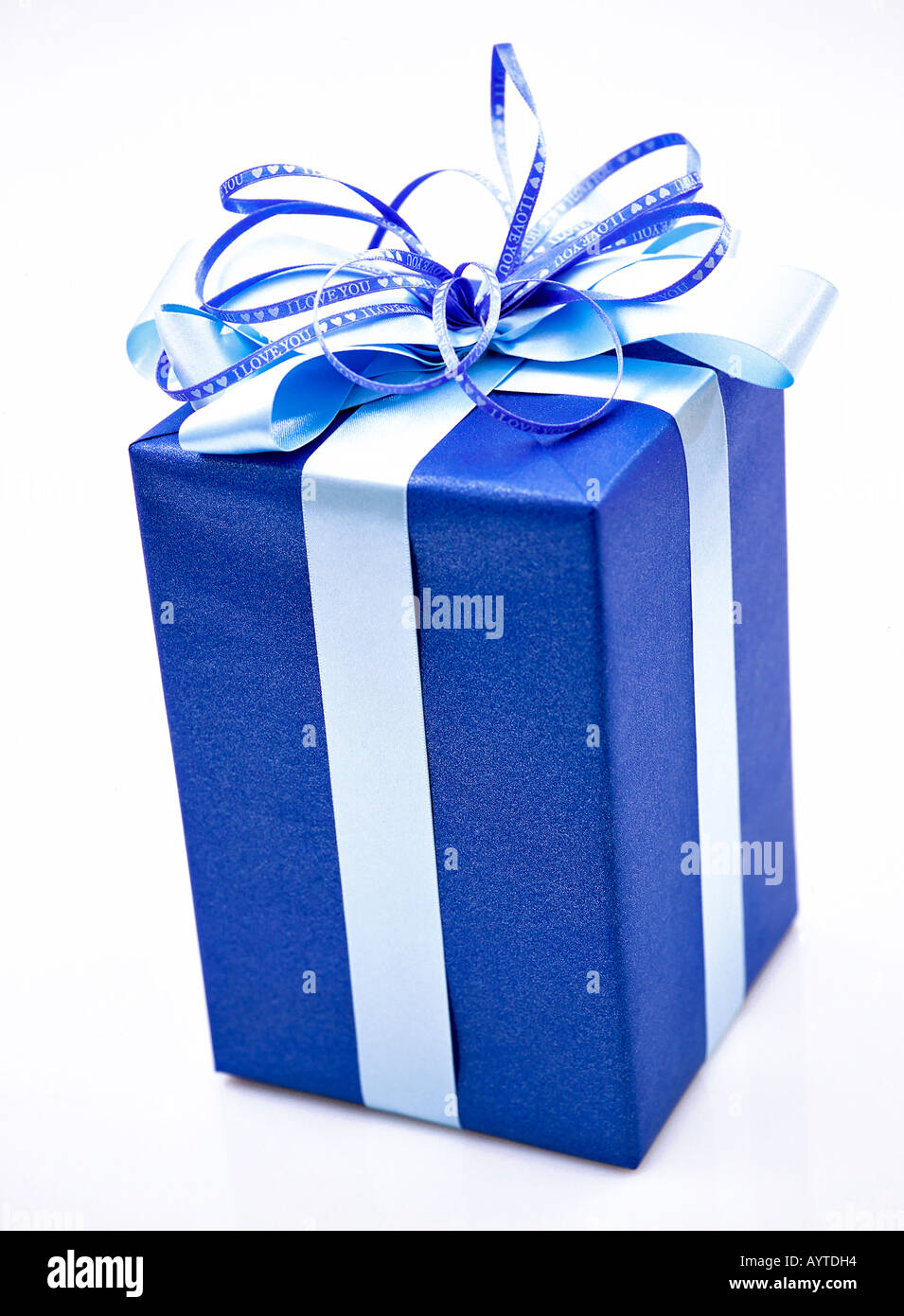 Gift wrapped in blue and silver expressing love Stock Photo - Alamy