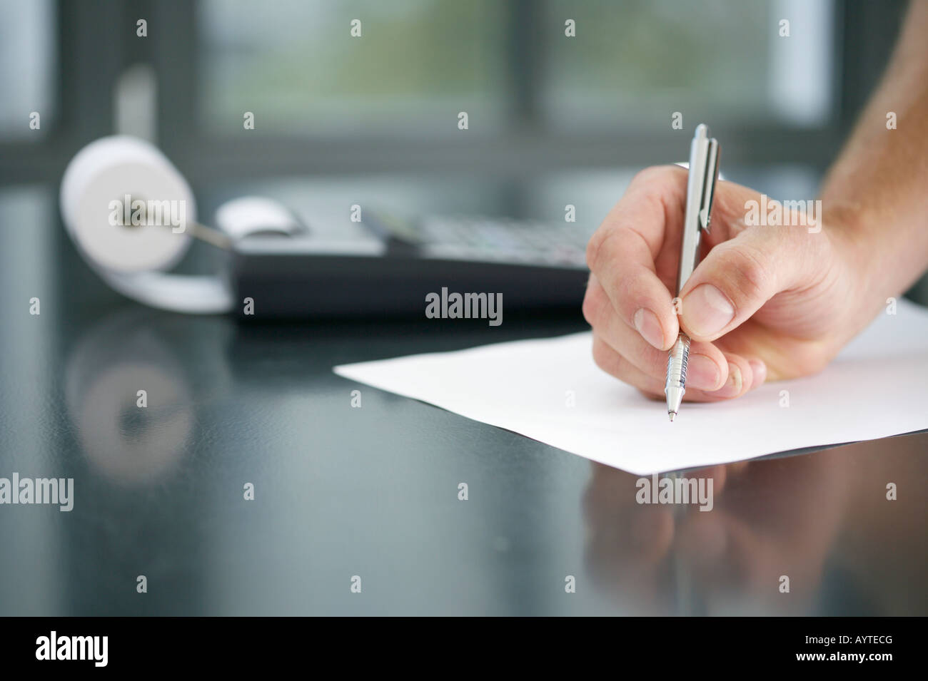 Man making notes Stock Photo - Alamy