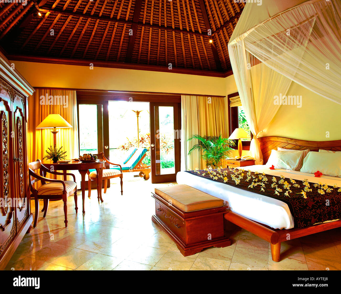 The inside of a hotel bedroom at an island resort Stock Photo - Alamy
