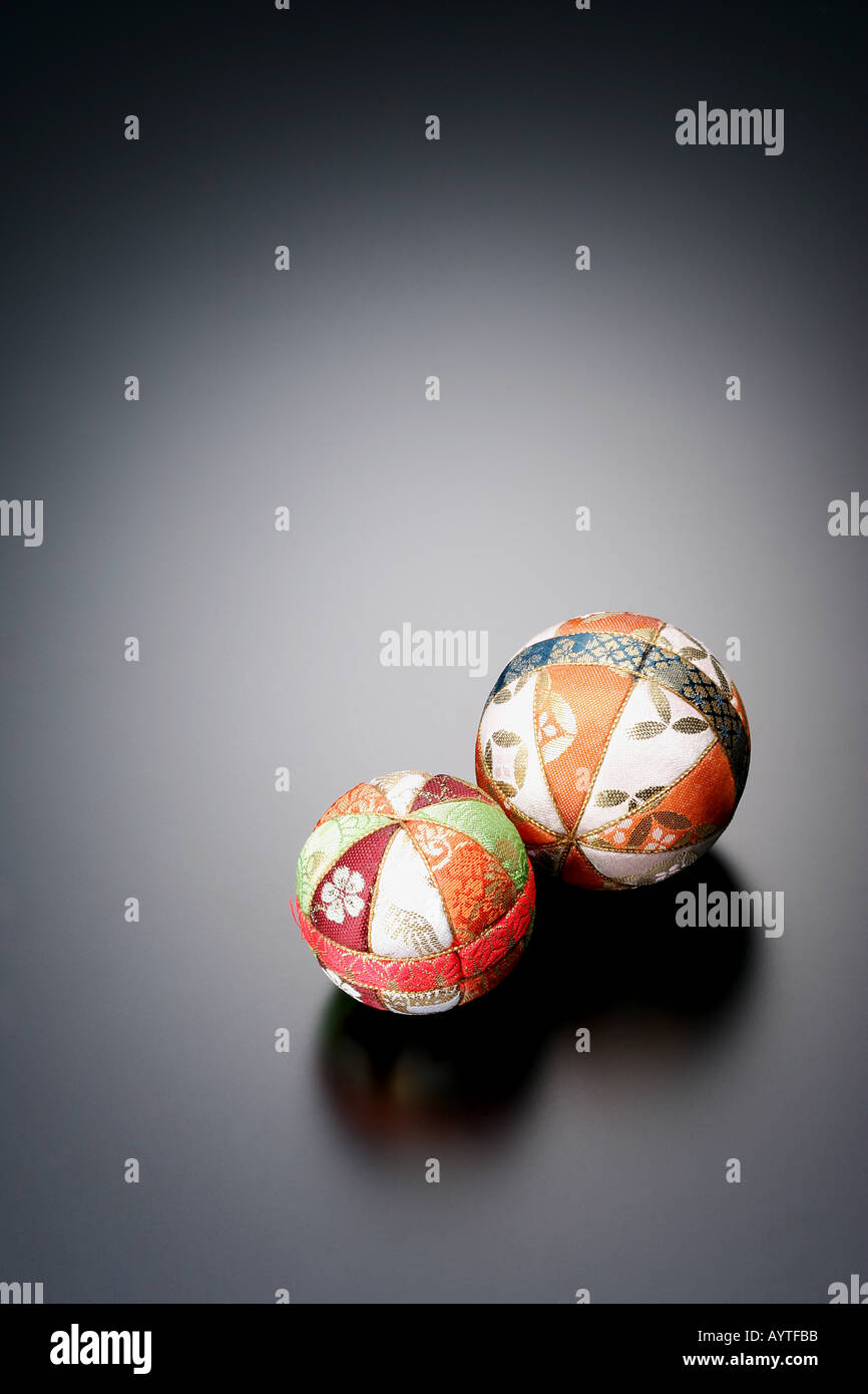 Two thread balls with a black background Stock Photo - Alamy