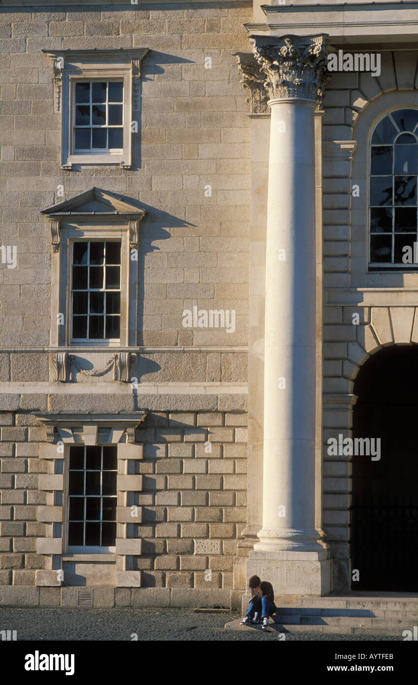 Student reading outside Trinity college Library Dublin city centre Eire ...