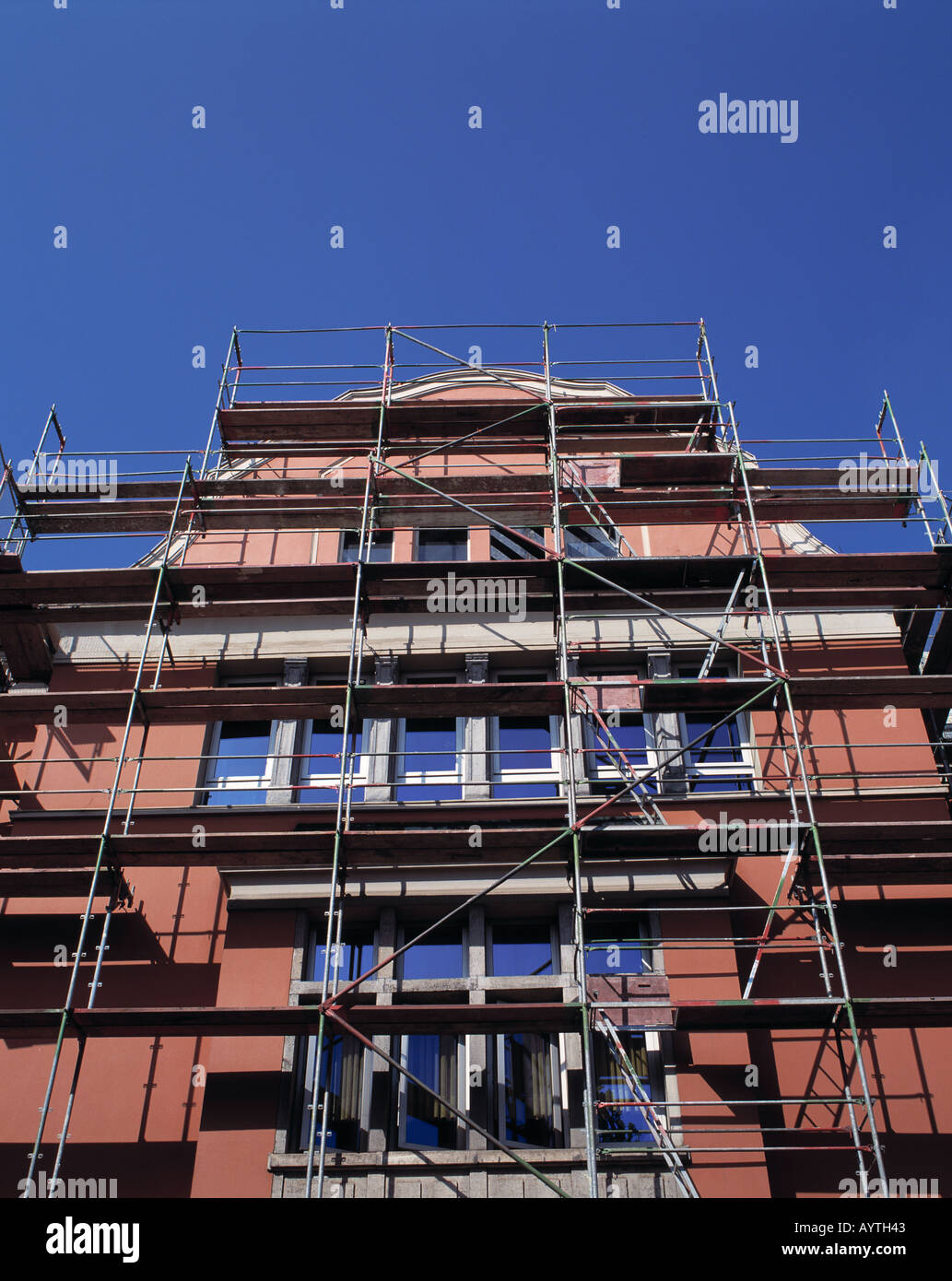 building with scaffold, house facade, construction works, building site ...