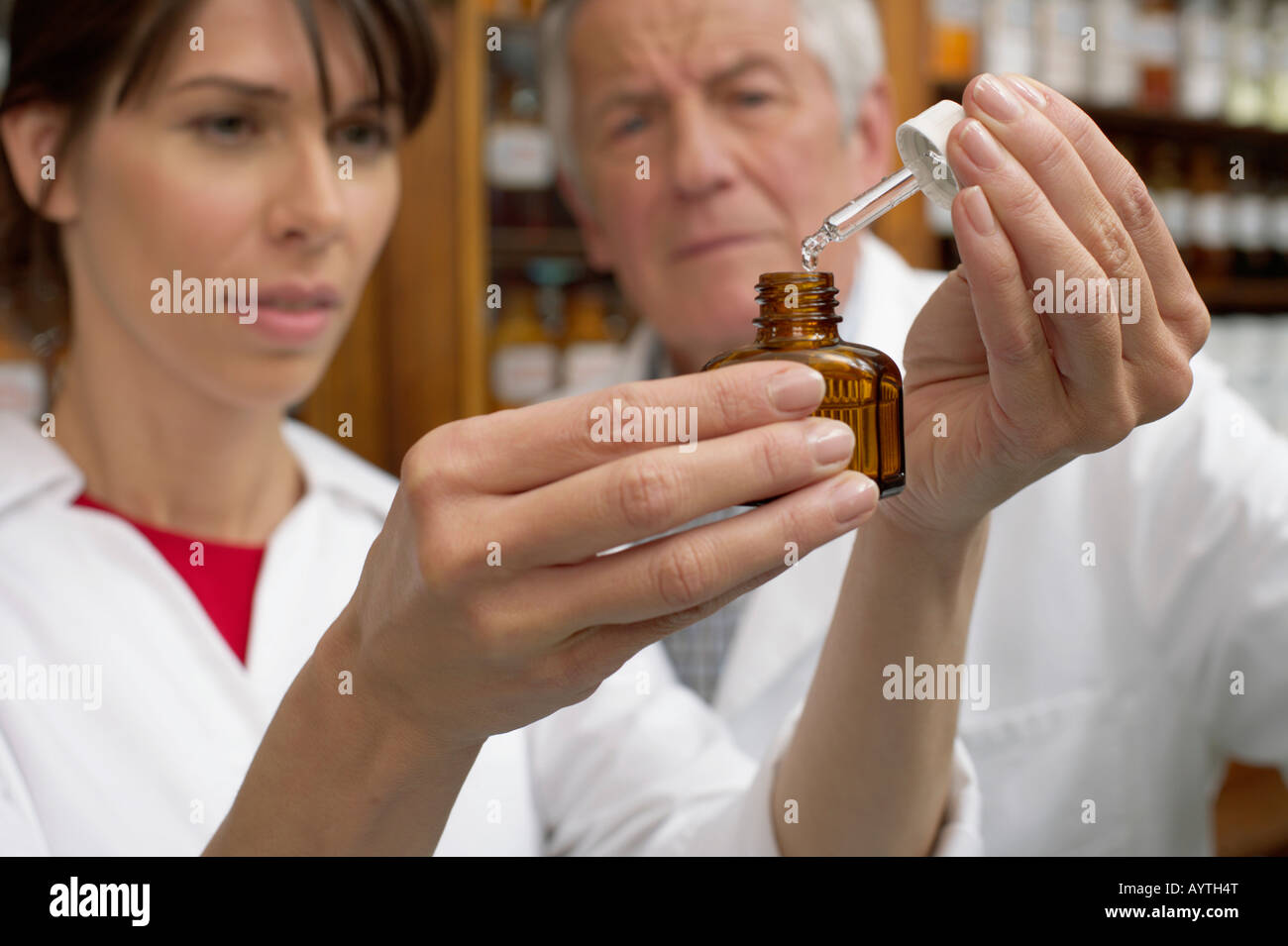 Two pharmacists preparing drug Stock Photo - Alamy