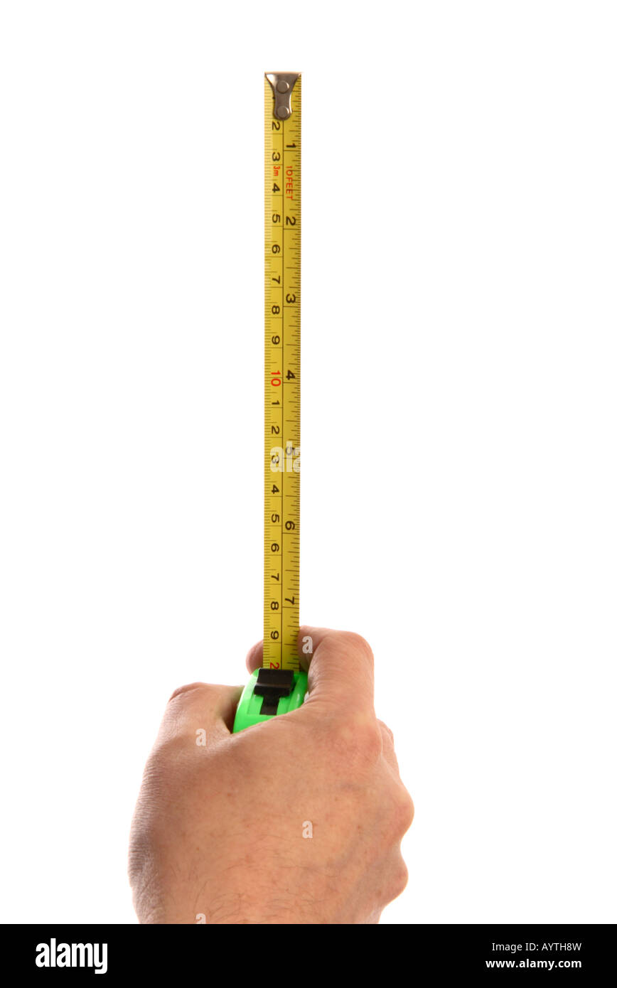 Hand holding up a tape measure Stock Photo - Alamy