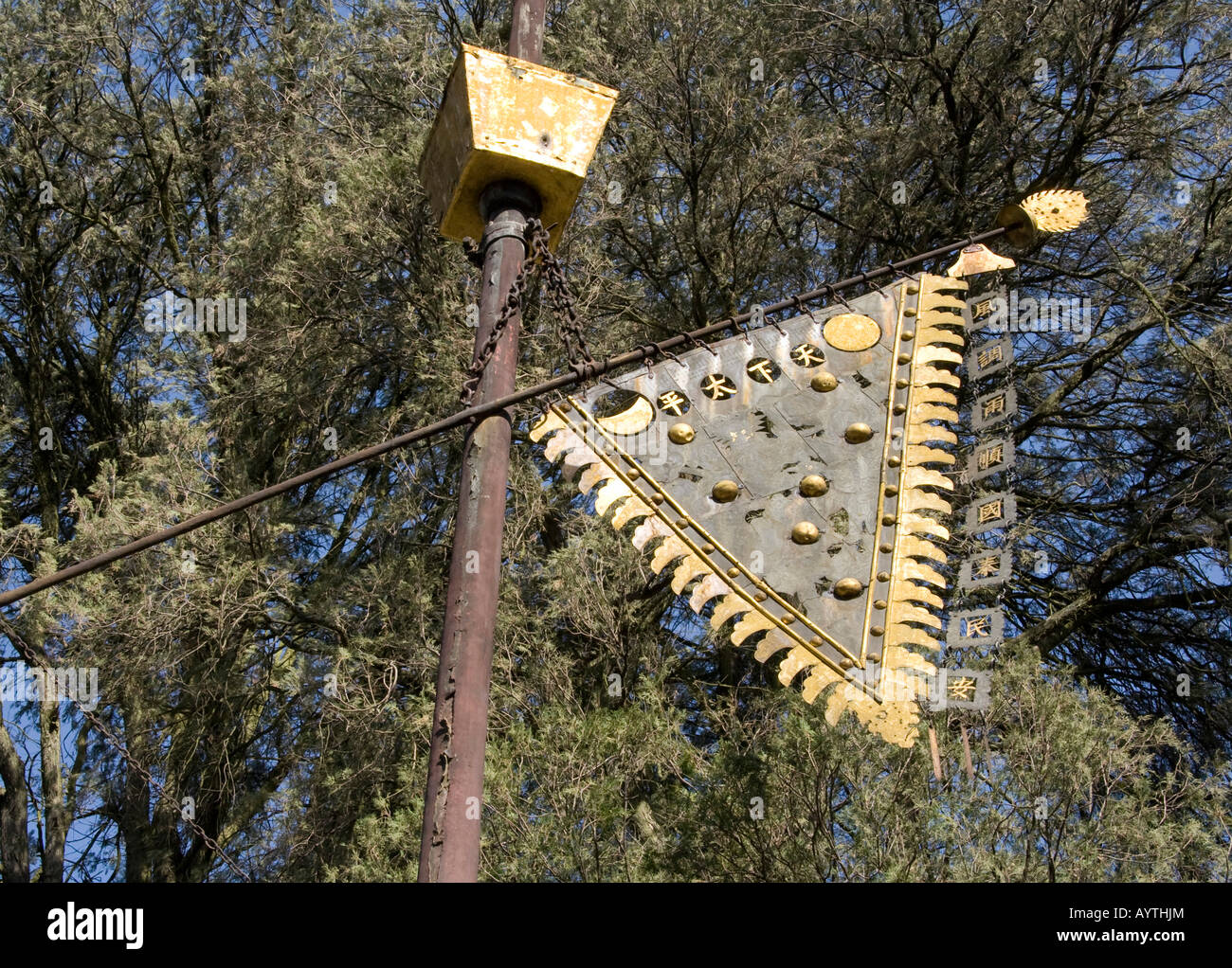Flag pole surrounding the Golden Temple, loacted outskirts of Kunming ...